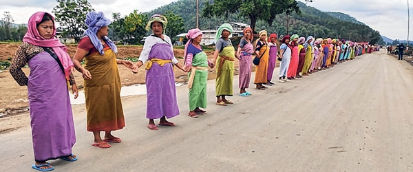 Human chain resonates with NRC call - The Sangai Express - Largest ...