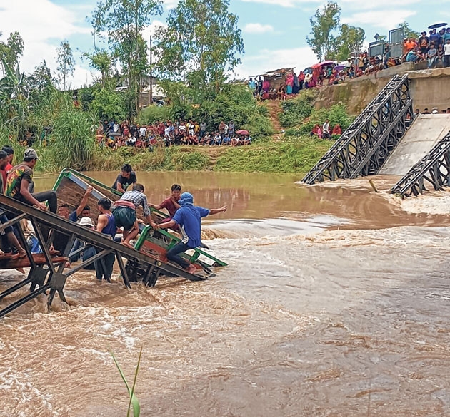 Truck plunges into river as bridge collapses, driver missing - The ...