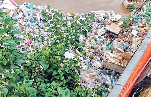 Plastic bottles clogging rivers, causing flood : Officials - The Sangai ...
